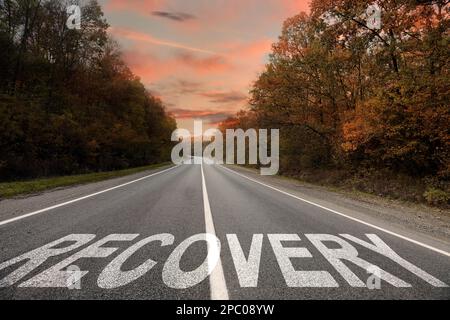 Start to live without alcohol addiction. Word RECOVERY on asphalt ...
