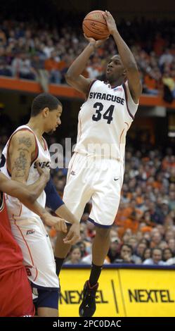 Syracuse's Demetris Nichols shoots against Hofstra's Loren Stokes ...