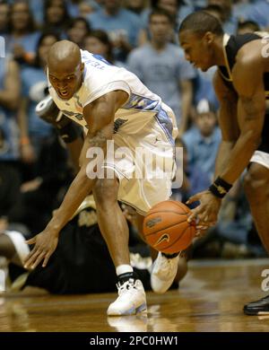 North Carolina's Reyshawn Terry, left, rebounds after Murray State's ...