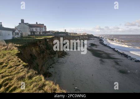 A view of the northeastern coastal village of Happisburgh, in Norfolk ...