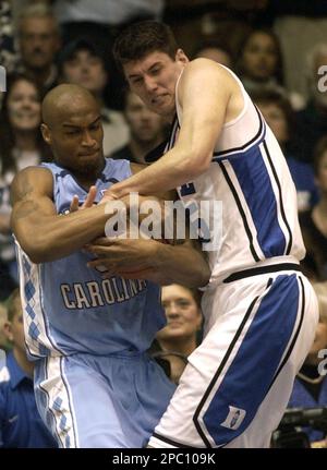 North Carolina's Reyshawn Terry, left, rebounds after Murray State's ...