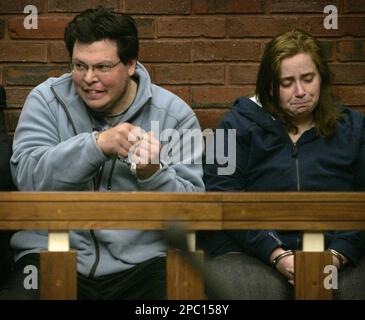Michael Riley, 34, and his wife, Carolyn Riley, 32, are shown in ...