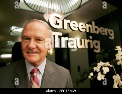 Former Massachusetts Attorney General Tom Reilly, right, reacts when ...