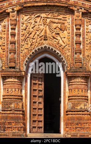 Terracotta carvings depicting war scenes and aspects of human life on ...