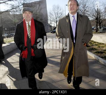 Journalist Matthew Cooper, left, and his attorney Richard Sauber arrive ...