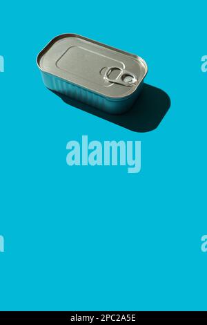 can of mackerel on blue background Stock Photo - Alamy