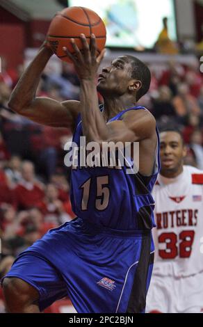 Seton Hall's Eugene Harvey (15), John Garcia (31) and Paul Gause, right ...