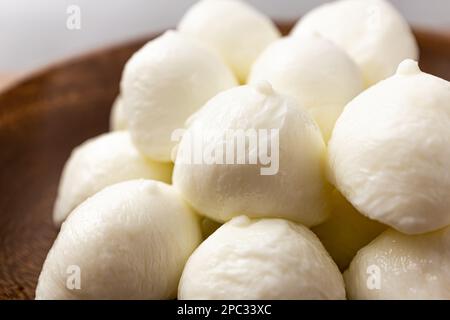 Soft and light mozzarella pearls cheese Stock Photo - Alamy