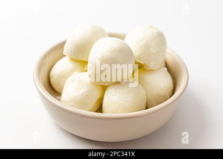 Mozzarella pearls cheese on white background Stock Photo - Alamy