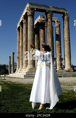 A female priestess participates in a rare ceremony honoring Zeus, the ...