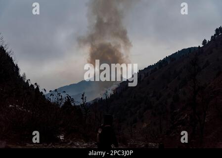 A mountain is seen engulfed in fire at Bubjen in the mountains of ...