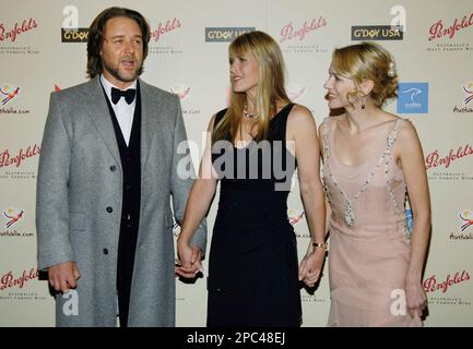 Actor Russell Crowe, left, poses with Terri Irwin, center, widow of ...