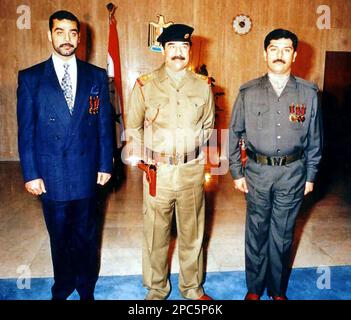 FILE - In this undated file photo, Iraqi ruler Saddam Hussein poses ...