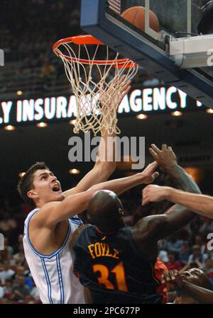 Golden State Warriors' center Adonal Foyle answers questions after ...