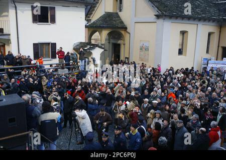 Residents of the small town of Viganella, in the Antrona Valley, north ...