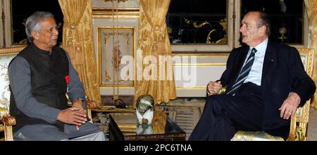 Nobel Peace Prize winner Muhammad Yunus poses with his wife Afroza ...