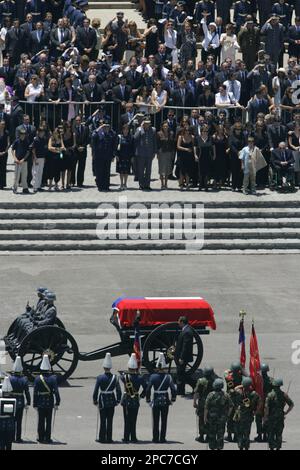 Relatives of former military ruler Gen Augusto Pinochet attend a mass ...