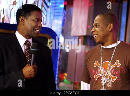 Actor Denzel Washington, left, and rapper Jay-Z appear onstage during ...