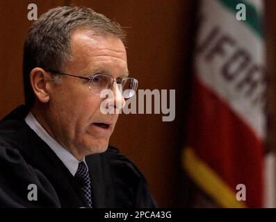 Judge Michael Johnson delivers a probation sentence to George Russell ...