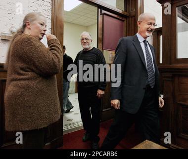 Sharen Gravelle, left, and Michael Gravelle, center, speak with ...