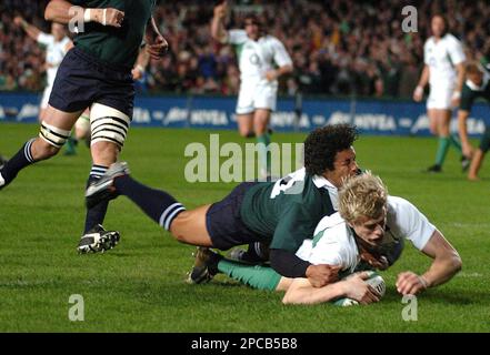 Bevin Fortuin of South Africa fails to stop Andrew Trimble of Ireland ...