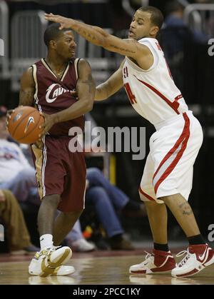 Ohio State's Jamar Butler, left, is trapped by Wisconsin's Trevon ...