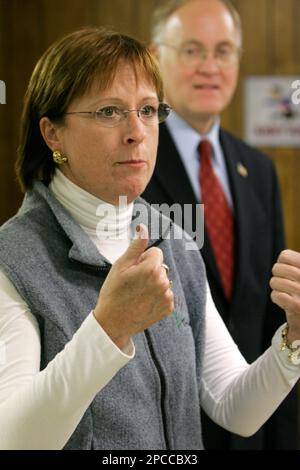 Republican candidate for Congress Martha Rainville, left, checks in to ...
