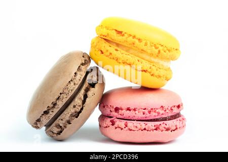Multi-coloured Macarons on white background Stock Photo - Alamy