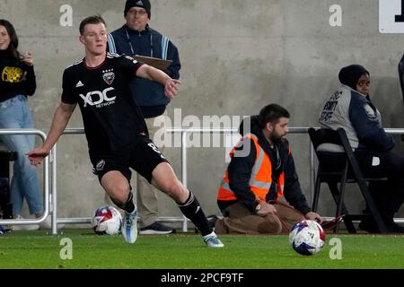 COLUMBUS, OH - MARCH 04: Chris Durkin (8) of D.C. United heads the ball ...
