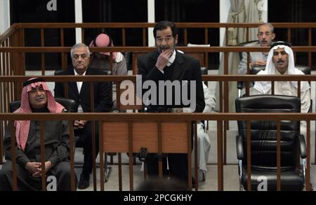 Saddam Hussein, front, and Hussein Rashid Mohammed, former deputy ...