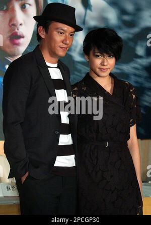 Taiwanese actors Chang Chen, left, and Ethan Juan pose during a press ...