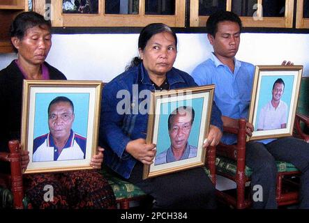The portraits of Fabianus Tibo, center, Dominggus da Silva, right, and ...