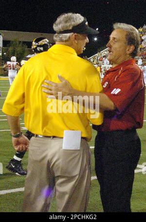 Southern Mississippi coach Jeff Bower, center, talks to his players ...