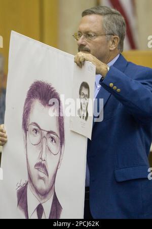 Assistant State Attorney John Aguero, left, goes over testimony from ...