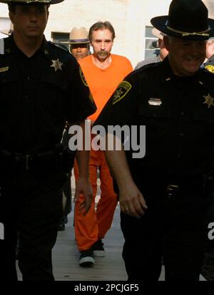 Chemung County Sheriffs escort Ralph "Bucky" Phillips toward the ...
