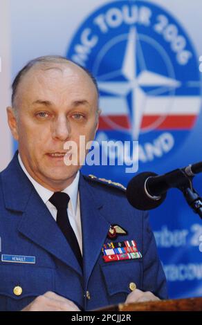 Canadian Gen. Ray Henault, Chairman of NATO Military Committee, center ...