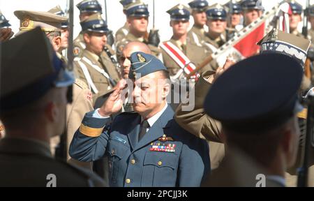 Canadian Gen. Ray Henault, Chairman of NATO Military Committee, center ...