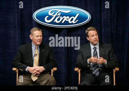 Boeing CEO Alan Mulally, left, reaches to shake hands with Chinese ...