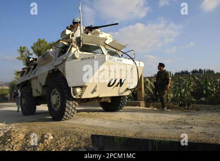 United Nations armoured personnel carriers stationed on Sniper Alley in ...