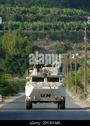 United Nations armoured personnel carriers stationed on Sniper Alley in ...