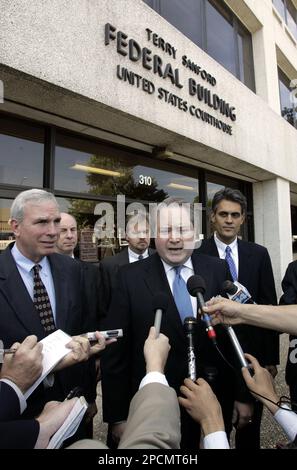 Former CIA contractor, David Passaro 38, center, is embraced by his ...