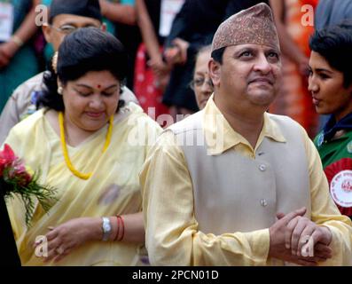 Nepal's King Gyanendra, right, and Queen Komal, offer prayers at ...