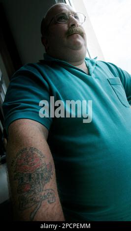 Bill Belanger, father of Erin Belanger, one of six murder victims looks ...