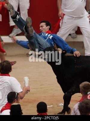 Two cows following a man Stock Photo - Alamy