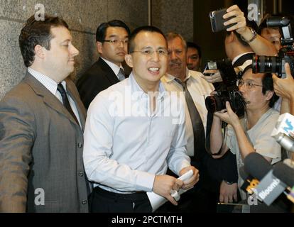 Richard Li, chairman of PCCW Ltd. talks during a press conference after ...
