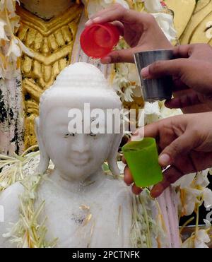 MYANMAR Shwedagon Pagoda, Yangon. Attending shrine Stock Photo - Alamy