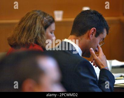 Christopher Porco wipes his eyes during lead prosecutor Michael ...