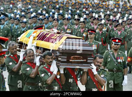 Soldiers carry the coffin of Maj. Gen. Rafiqul Islam, general officer ...