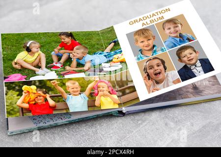 Open book, graduation album, photobook Stock Photo - Alamy