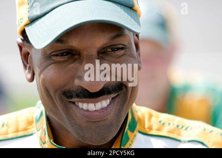 NASCAR driver Bill Lester smiles as he has his photo taked from his ...